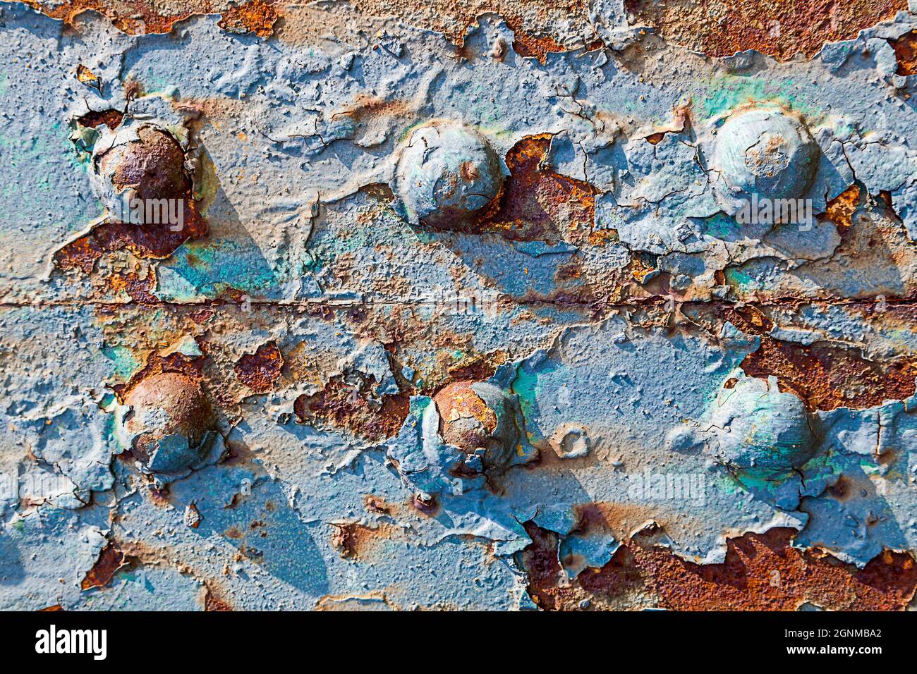 rusty and scratched metal panel background with six bolt Stock Photo ...