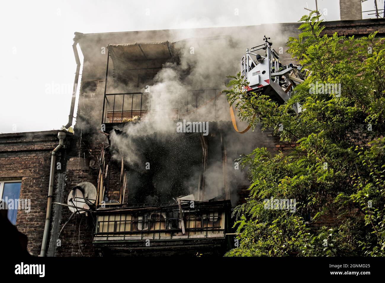 Fire in a residential five-story building. View of the burned-out ...