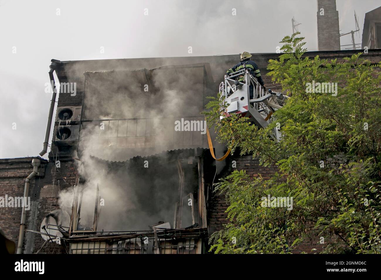 Fire in a residential five-story building. View of the burned-out ...