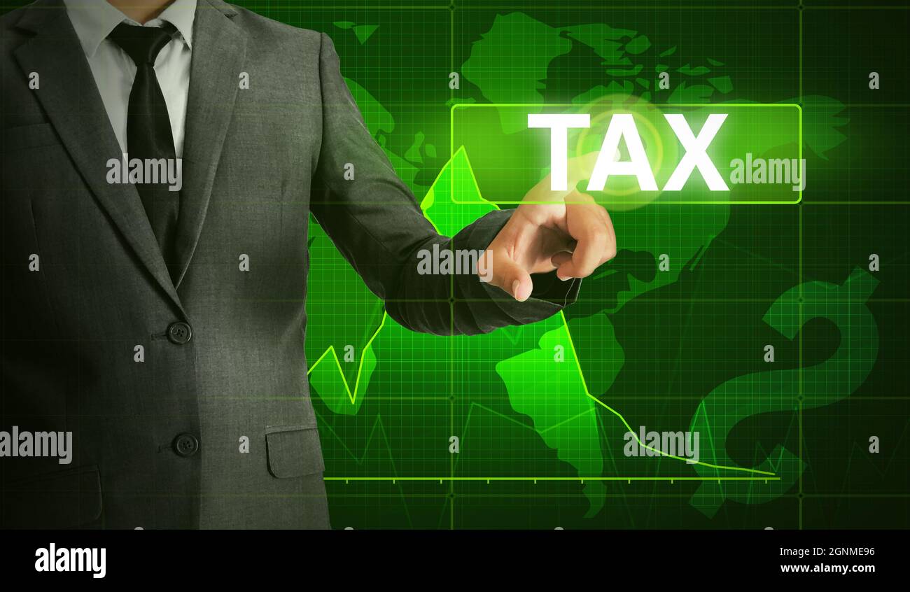 Tax Green Background with Businessman touching the Screen Stock Photo ...