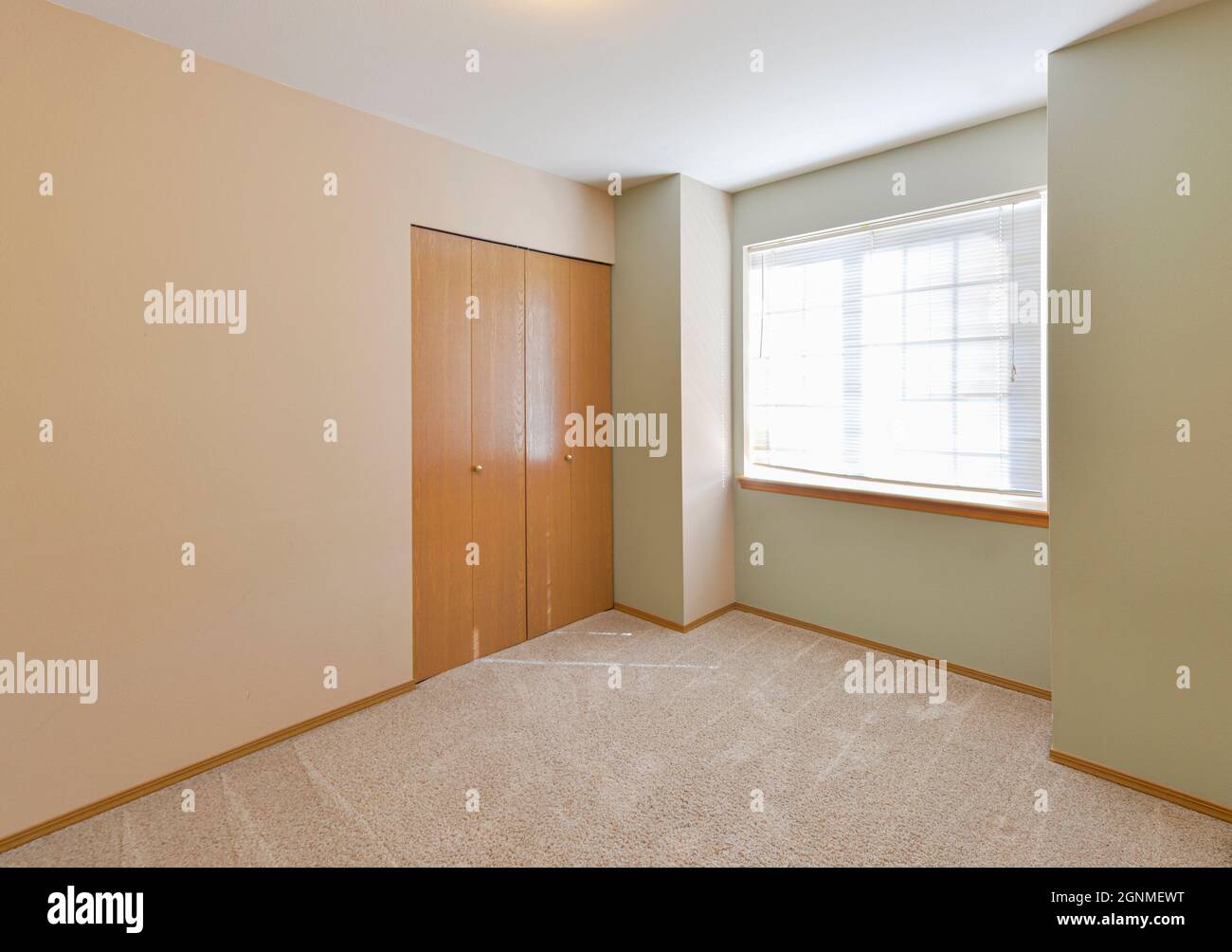 Modern residential empty bedroom interior Stock Photo - Alamy