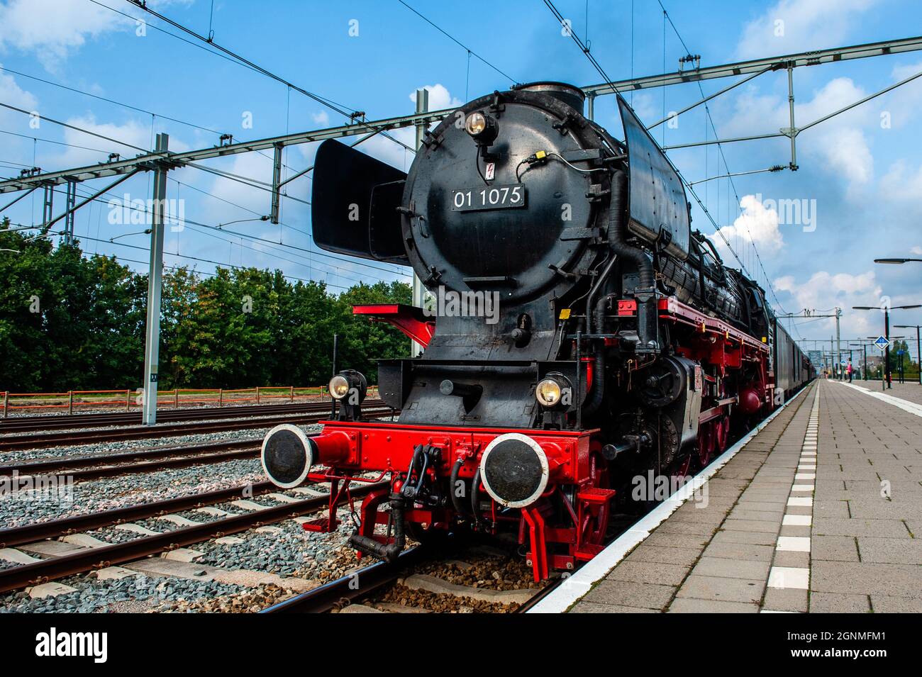 A view of the German 40's steam train arriving at the train station.A ...
