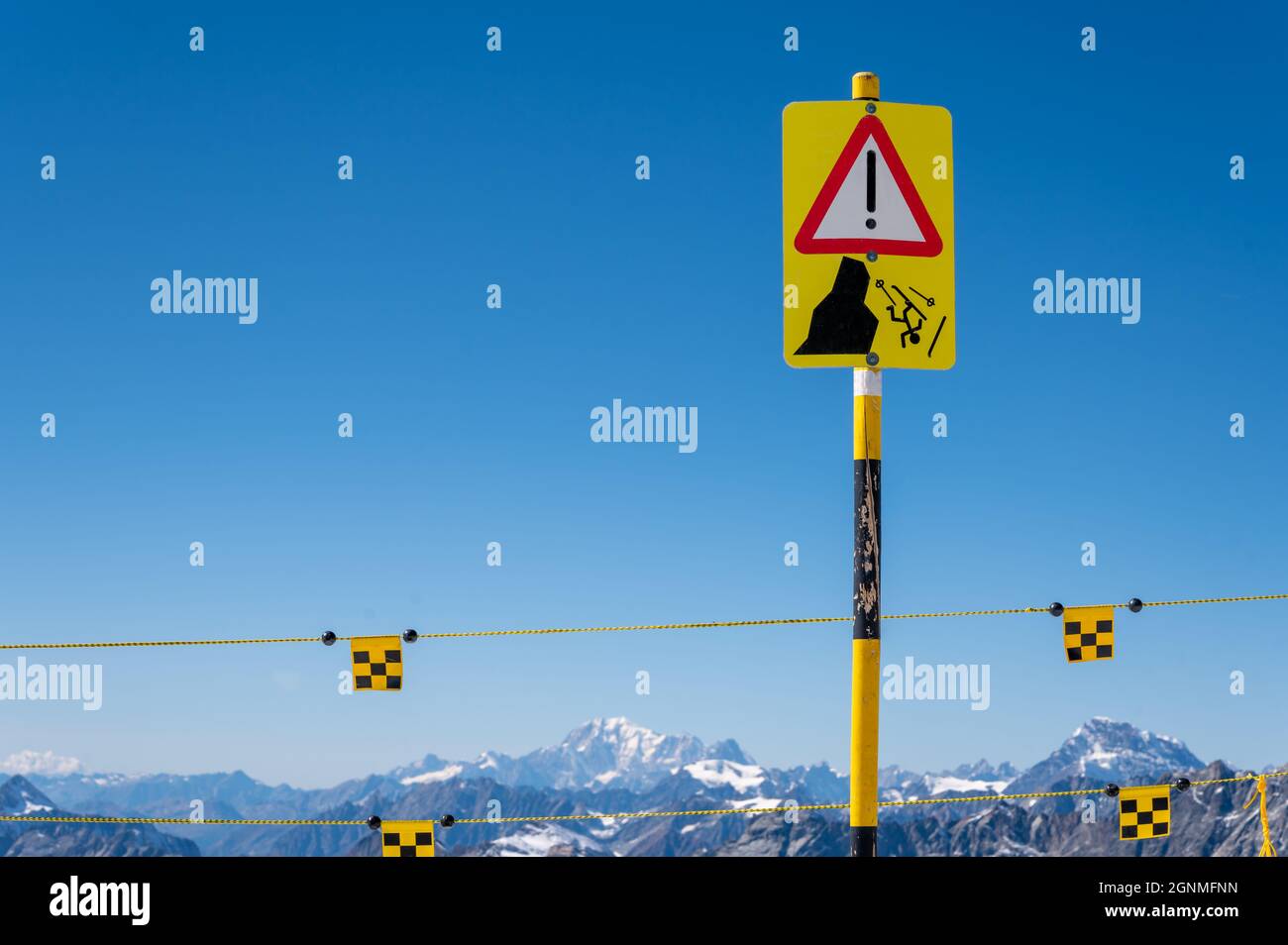 Warning sign of possible ski fall from the mountain. Accident Stock ...