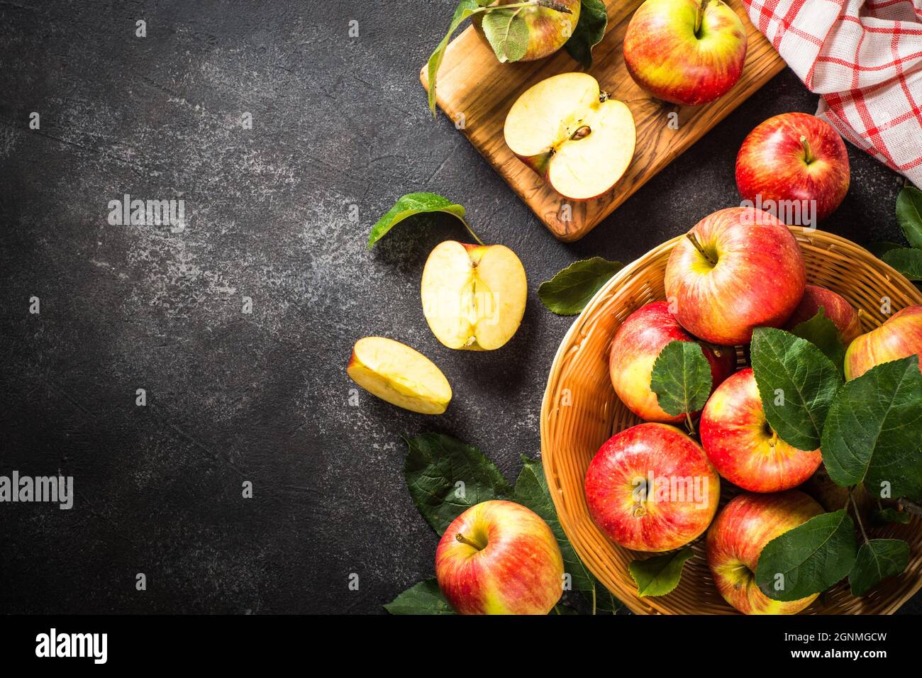 Fresh ripe red apples in the basket at white table Stock Photo - Alamy