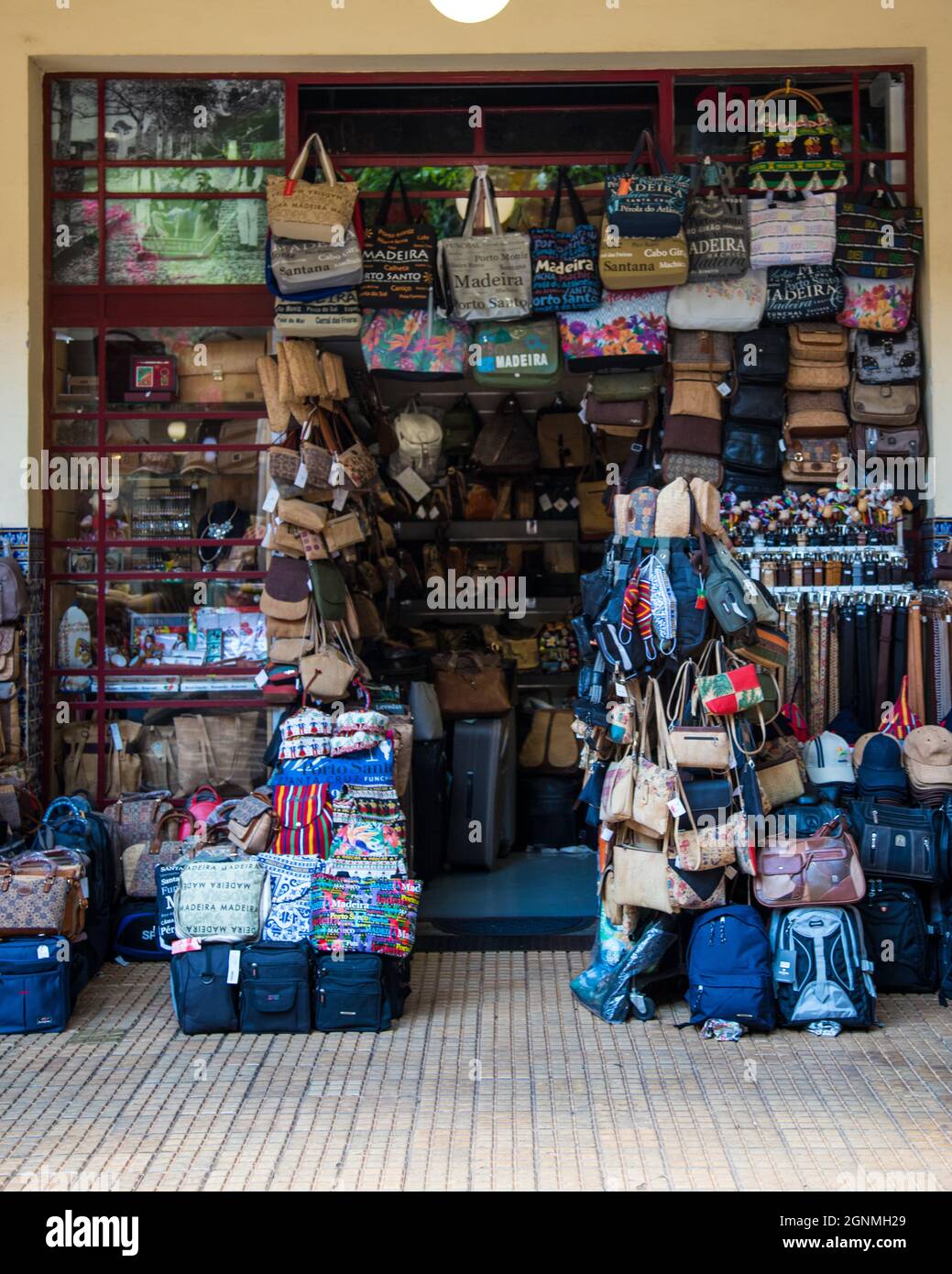 Traditional shops with merchandising like bags and t-shirts in the ...