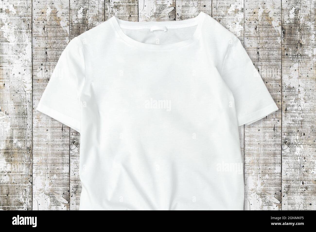 T-shirt mock up empty blank plain template rustic wooden background ...