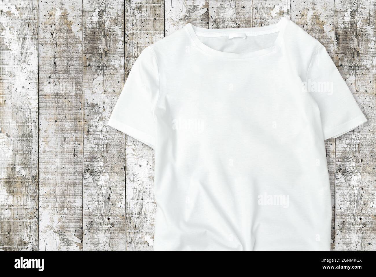 T-shirt mock up empty blank plain template rustic wooden background ...