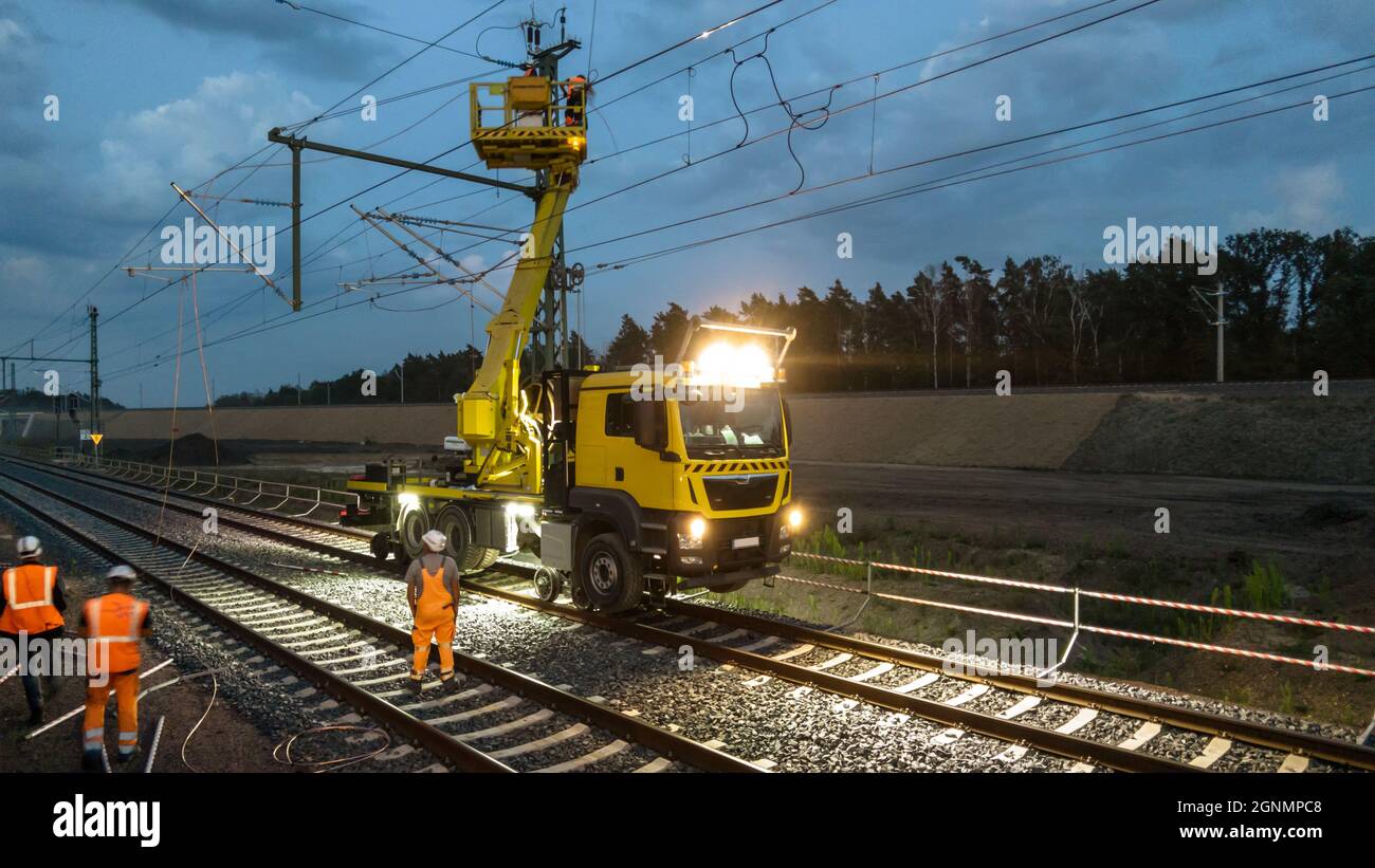 A truck as a two-way vehicle during overhead line work Stock Photo - Alamy