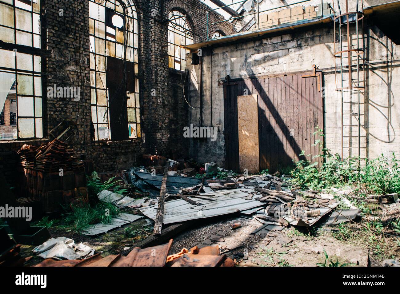 The ruins of an abandoned, historical building with scattered debris ...