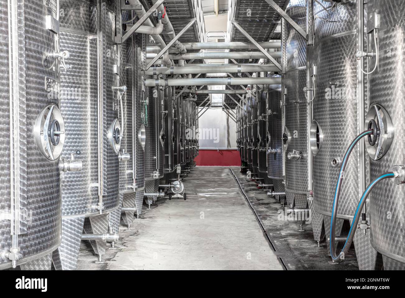 Steel wine tanks for wine fermentation at a winery. modern wine factory ...