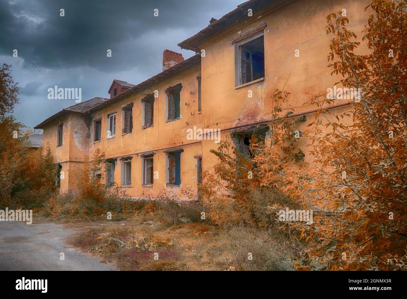 The ruins of a destroyed building in the city. Old abandoned collapsing ...