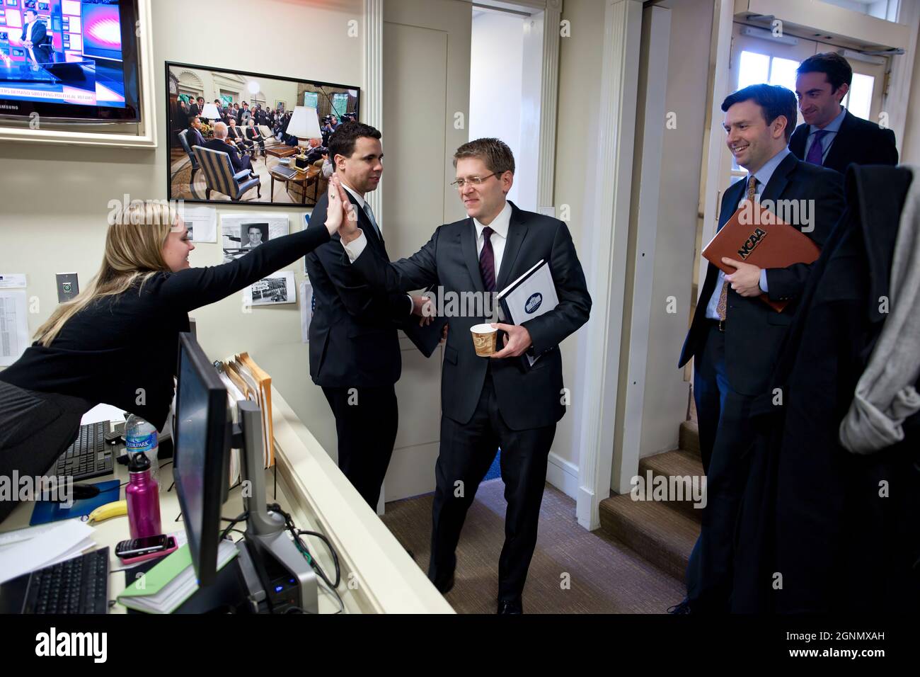 White House Press Secretary Jay Carney gives Press Assistant Caroline ...