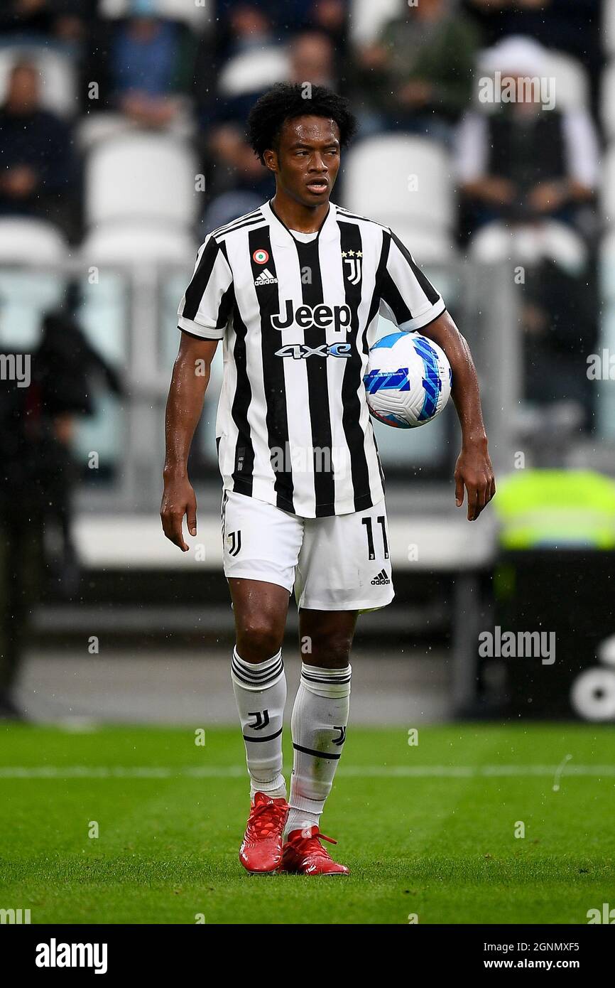 Turin, Italy. 26 September 2021. Juan Cuadrado of Juventus FC holds the ...