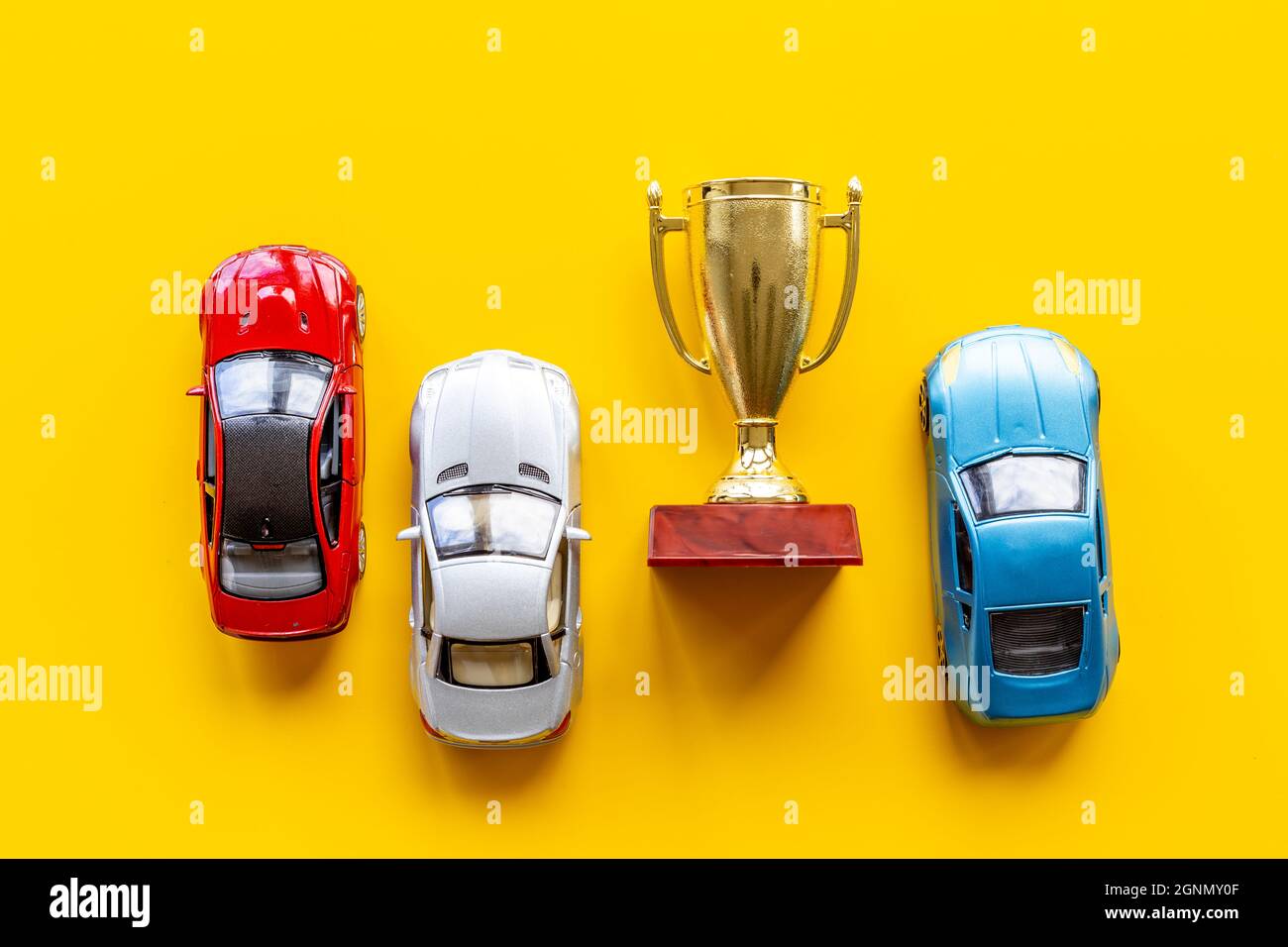 Sport rally car champion award - golden trophy cup with car models, top ...