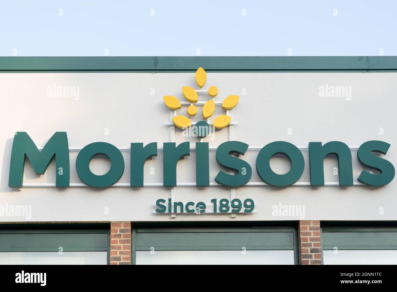Morrisons since 1899 Logo and its brand name on the outside the shop ...