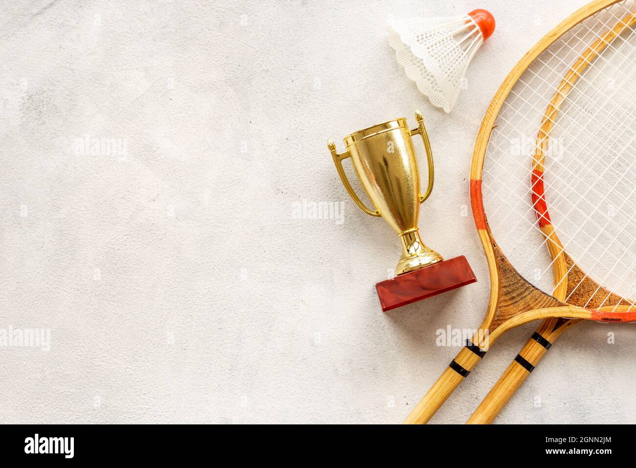 Badminton winner award - small golden trophy cup with rackets and ...