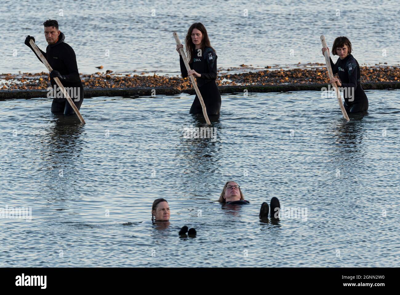 Artistic performance in the Thames Estuary by the Arbonauts at dusk to ...