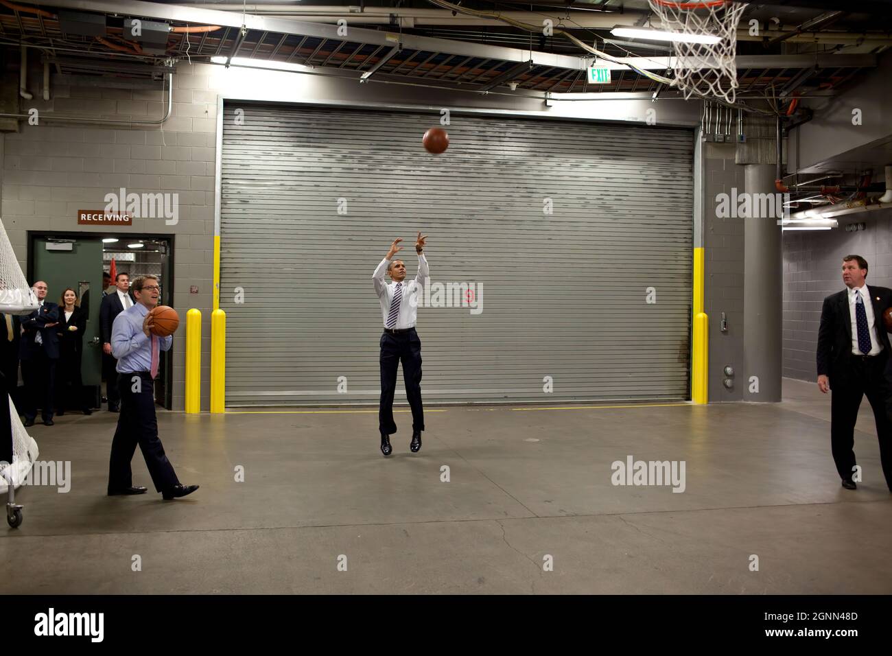 President Barack Obama, along with Press Secretary Jay Carney, left ...