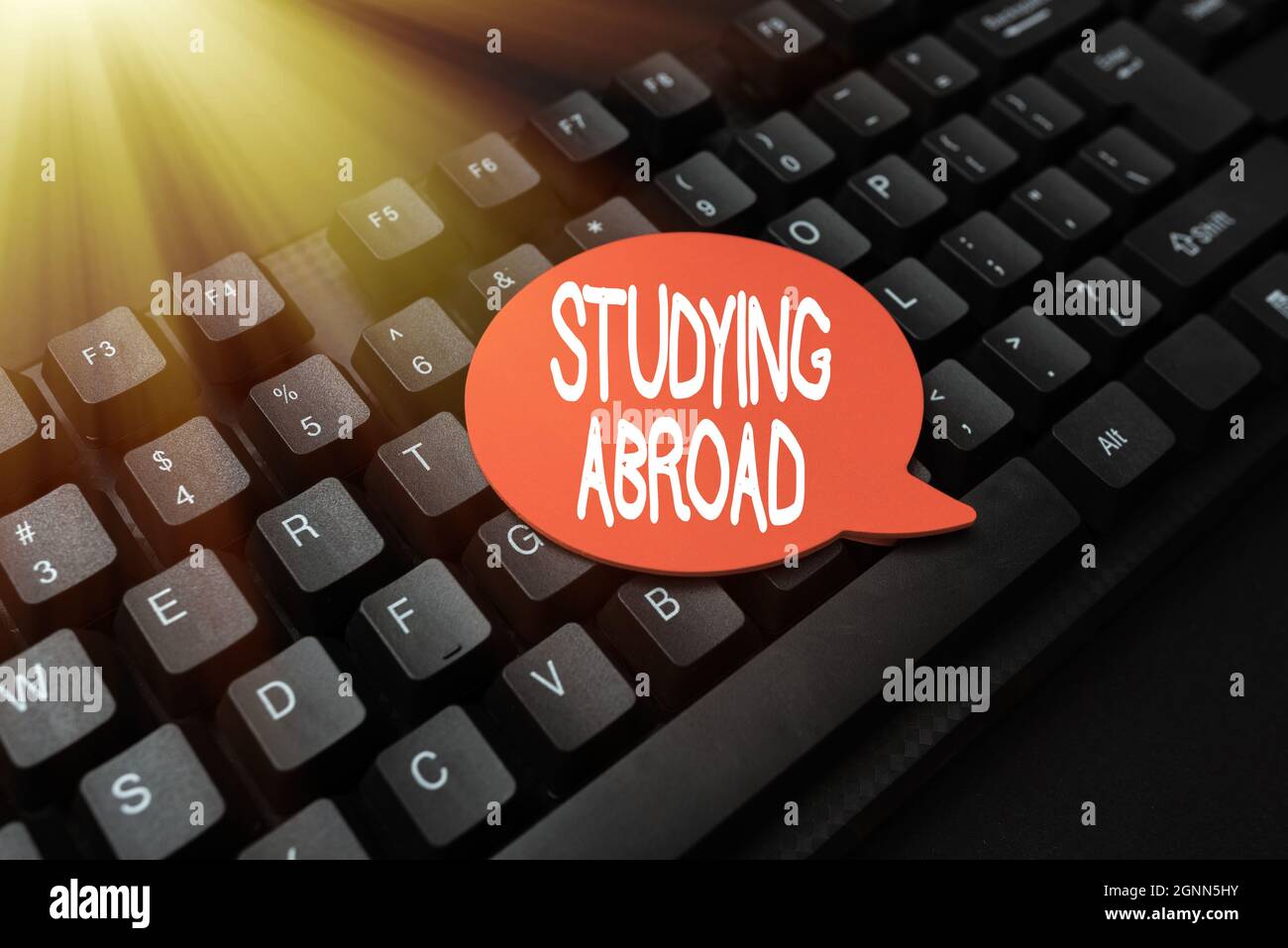 Hand writing sign Studying Abroad. Concept meaning learn outside of ...