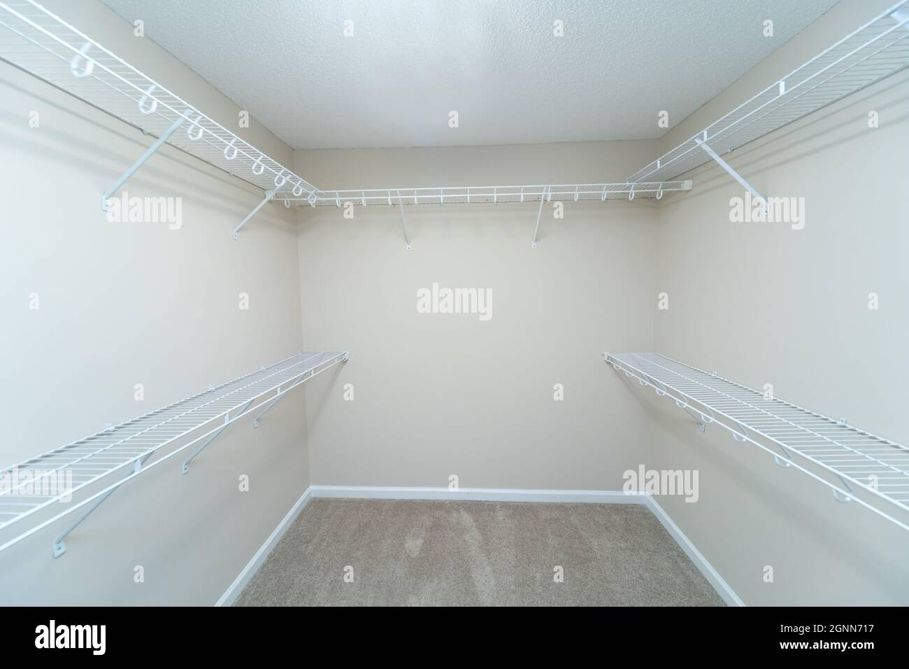 Empty wire shelving storage in an empty closet Stock Photo - Alamy