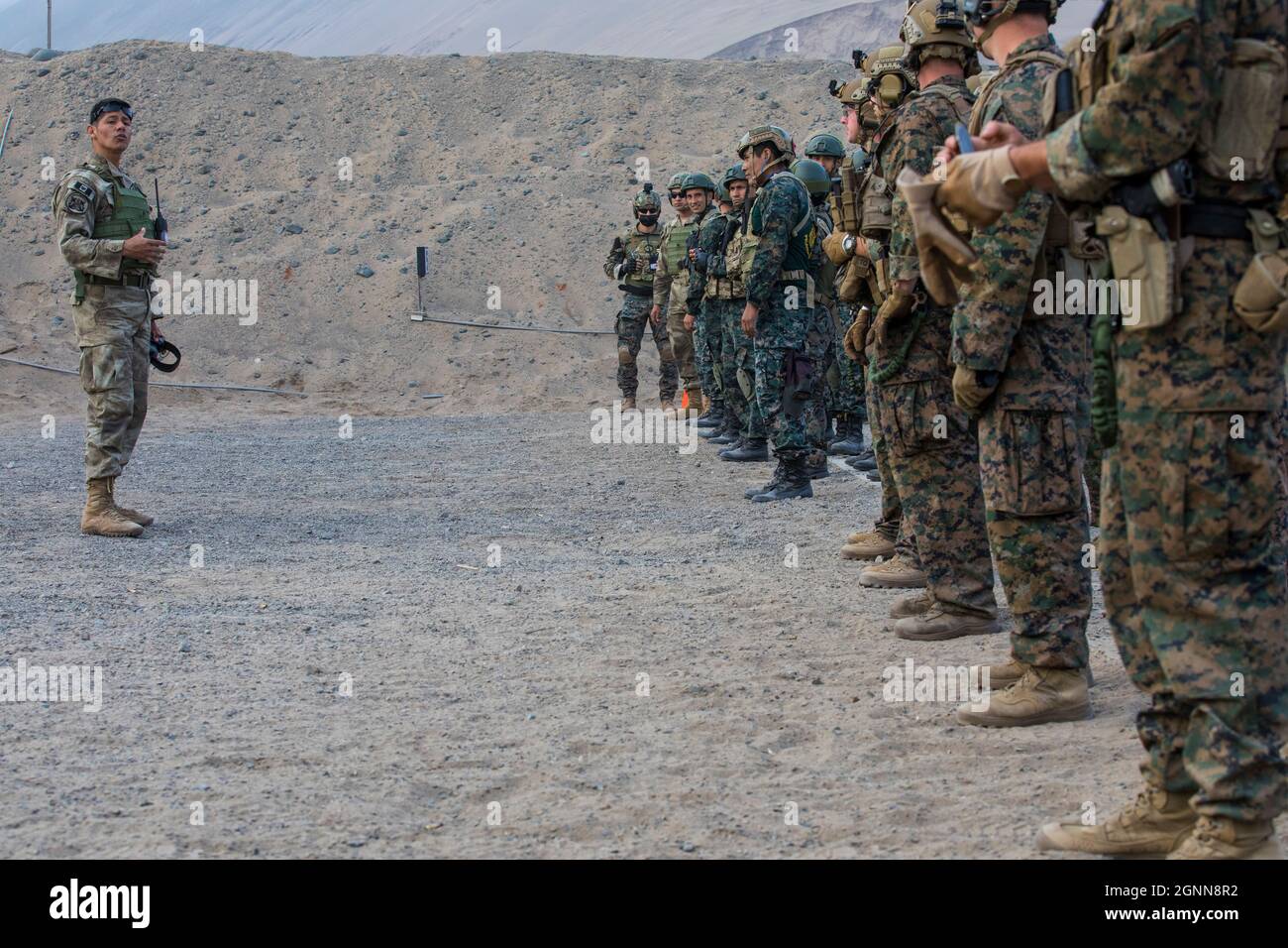 A Peruvian Marine briefs U.S. Marines with 2nd Reconnaissance Battalion ...