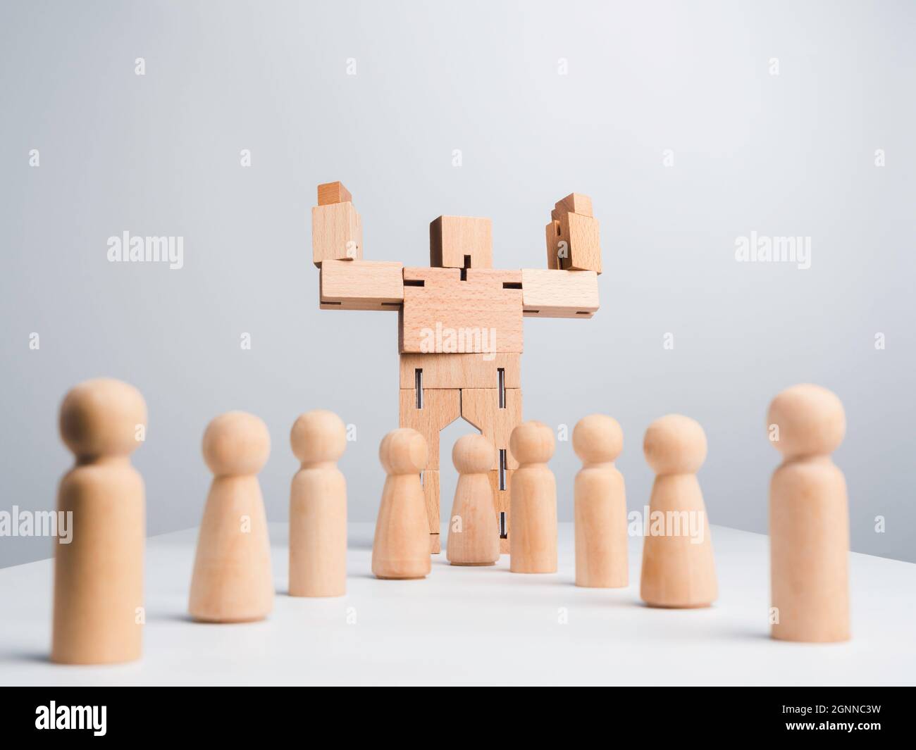 Leadership concept. The Leader or influencer, wooden robot strong power ...