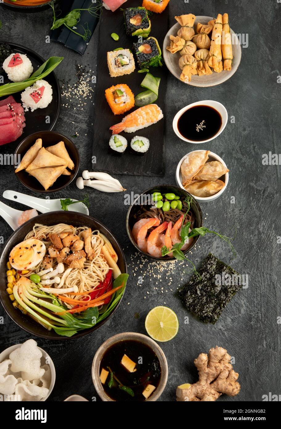 Japanese dishes and snacks on gray background. Traditional food concept ...