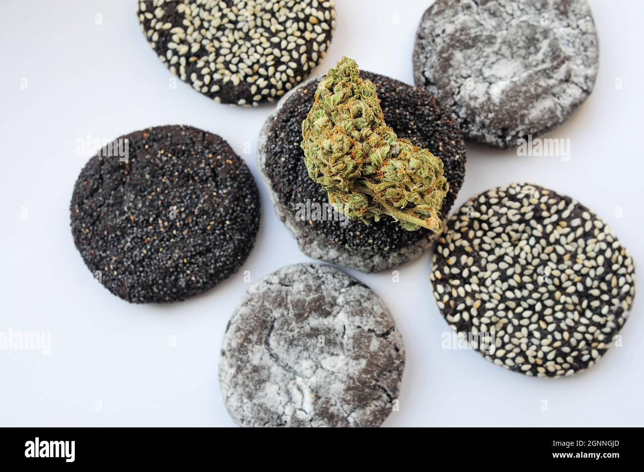 Cookies and marijuana blooms isolated on white background. Cannabis ...