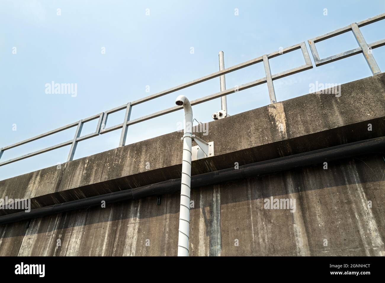 Ventilation pipes on the side wall of a concrete building Stock Photo ...
