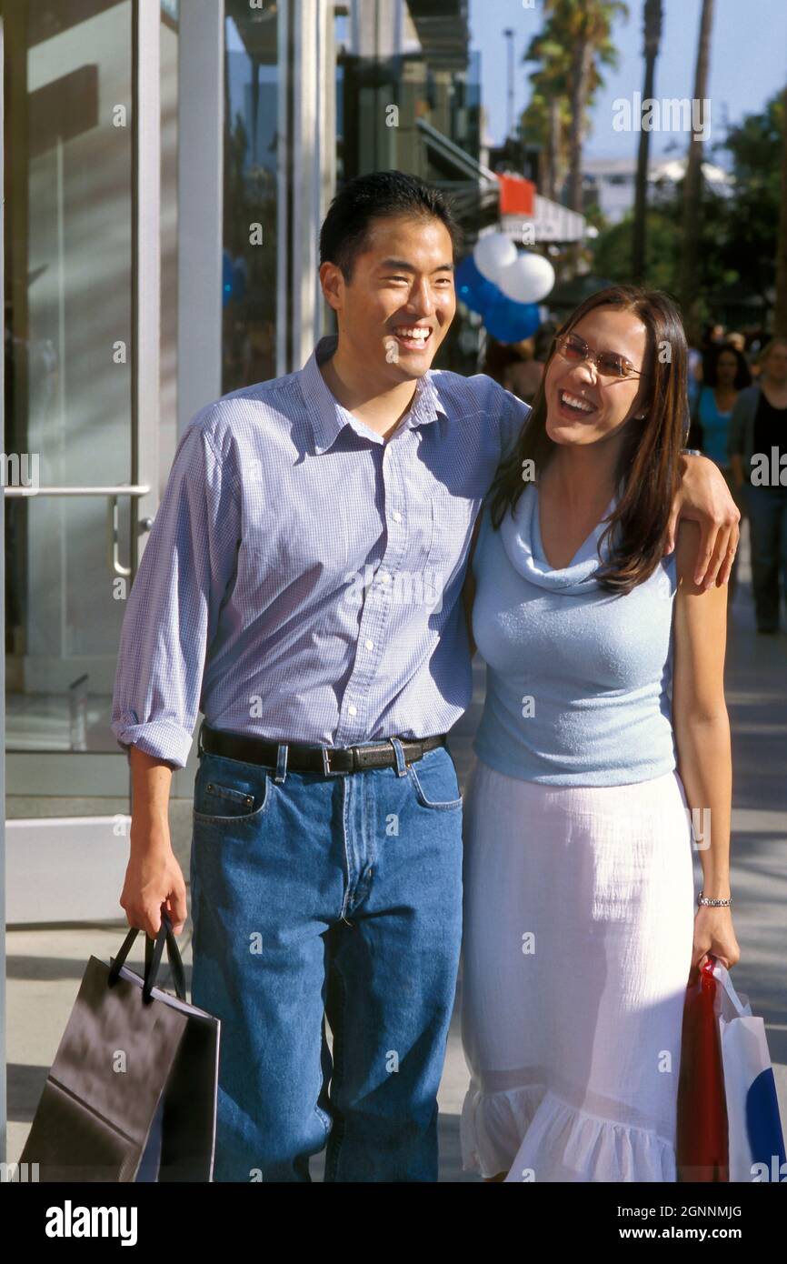 An Asian American couple out shopping in Los Angeles, California model ...