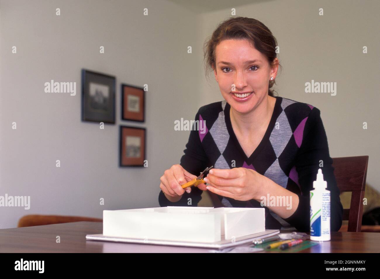 interior designer building a model for a client MR - Model Released ...