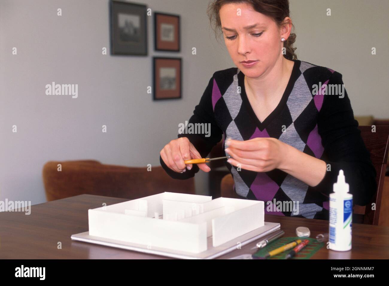 interior designer building a model for a client MR - Model Released ...
