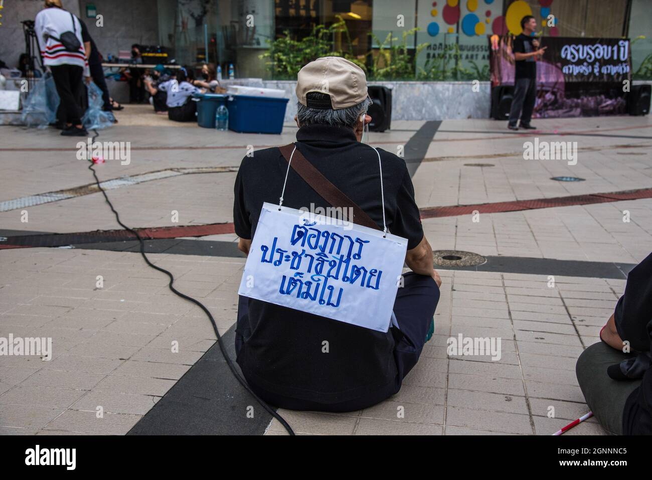 A protester wears a placard with a massage that says Need Absolute ...