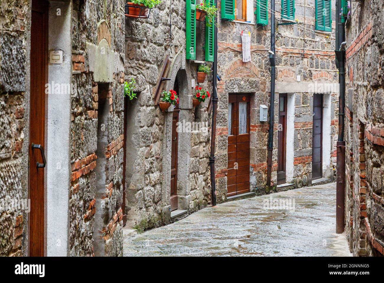 Back street with doors and windows Stock Photo - Alamy