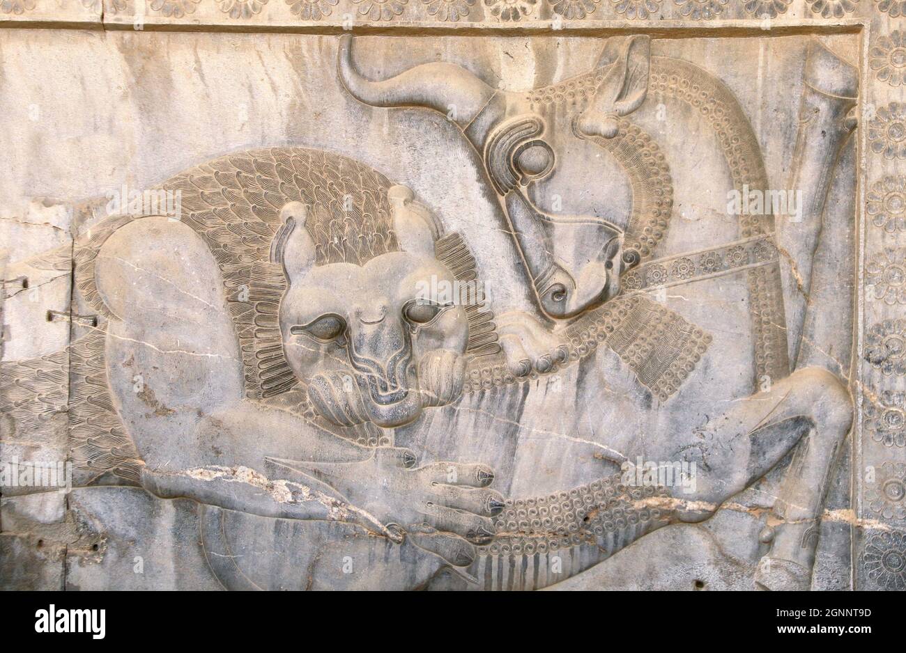 Famous bas-relief on the wall in ancient city Persepolis, Iran. The ...