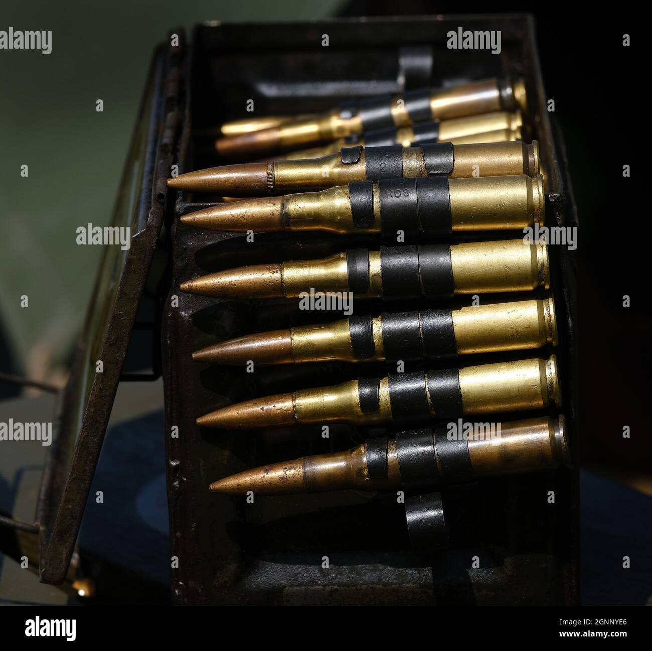Belt of machine gun ammunition ready to feed to weapon Stock Photo - Alamy