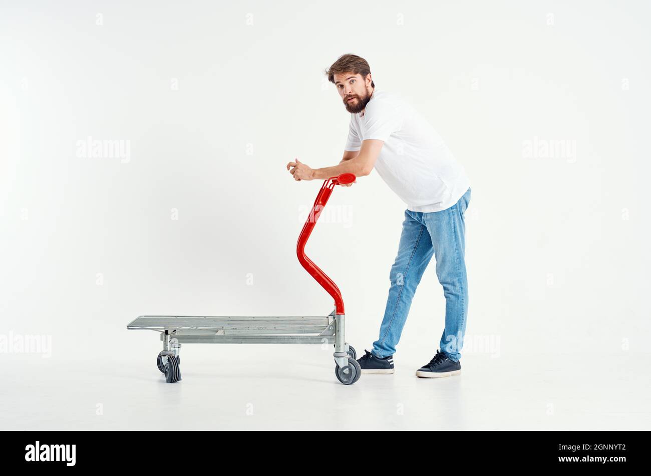 bearded man ride a cart entertainment shipping light background Stock ...