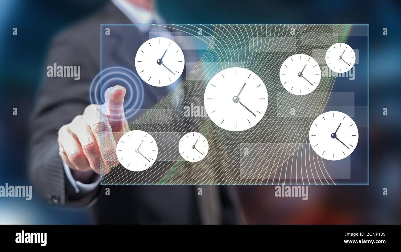 Man touching a time management concept on a touch screen with his ...