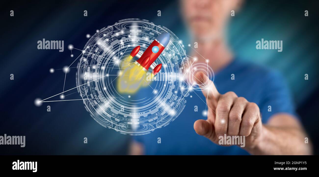 Man touching a high technology startup on a touch screen with his ...