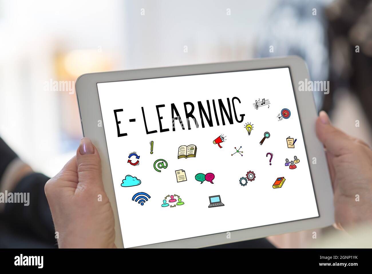 Tablet screen displaying an e-learning concept Stock Photo - Alamy