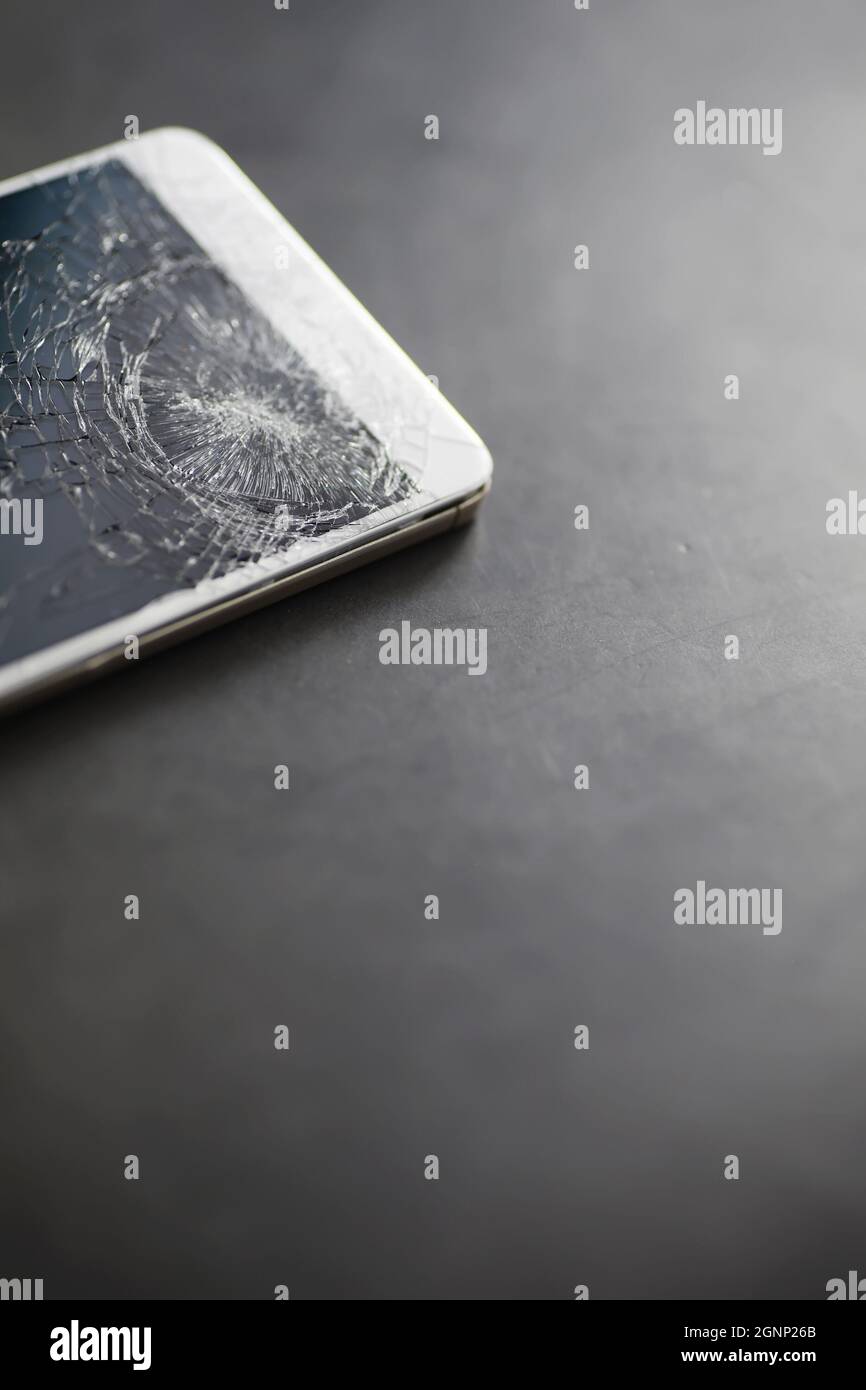 Crack on the glass. Broken screen. Broken phone. Cracked glass ...