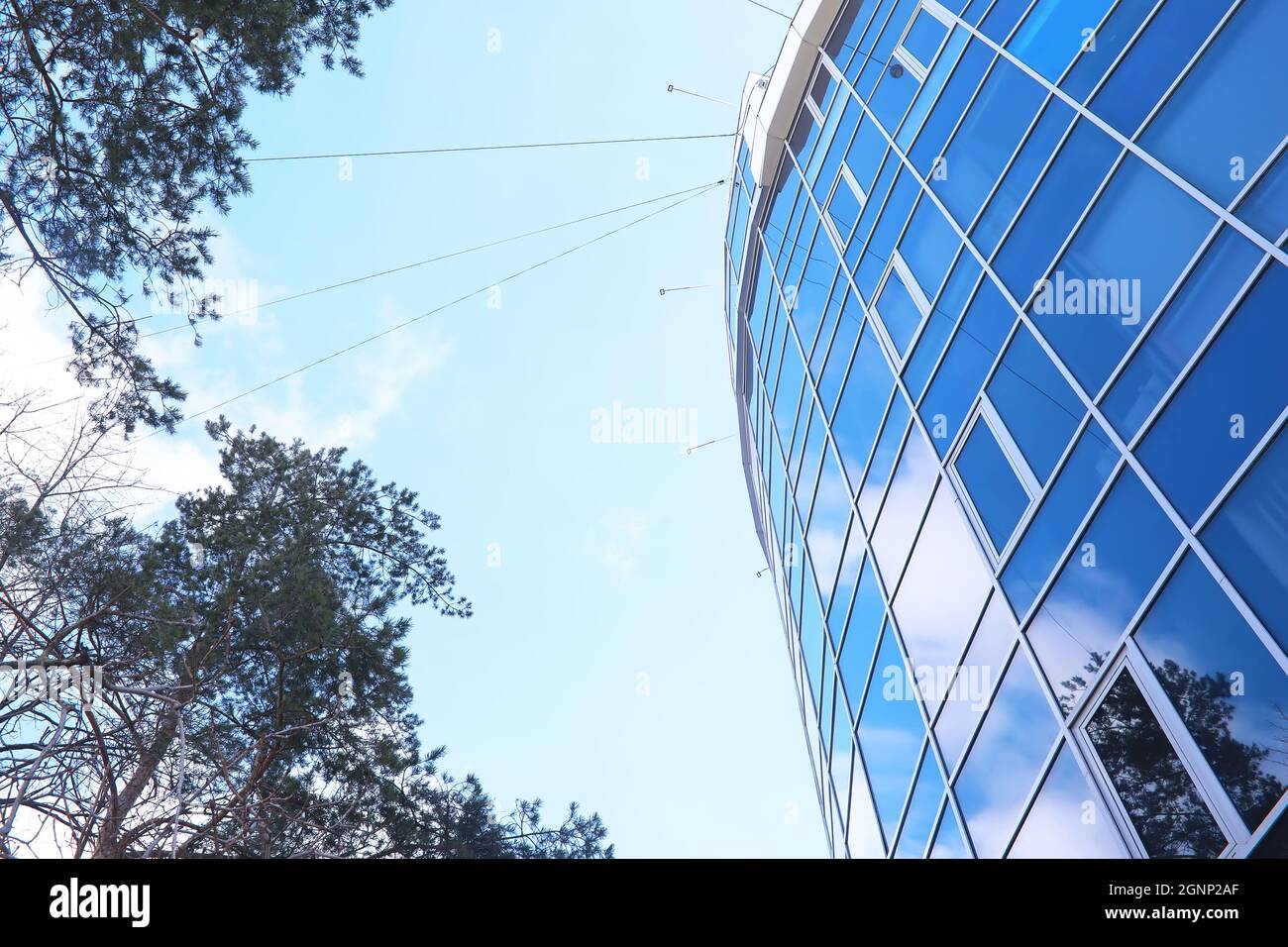 Architectural detail of the facade with multiple reflections of other ...