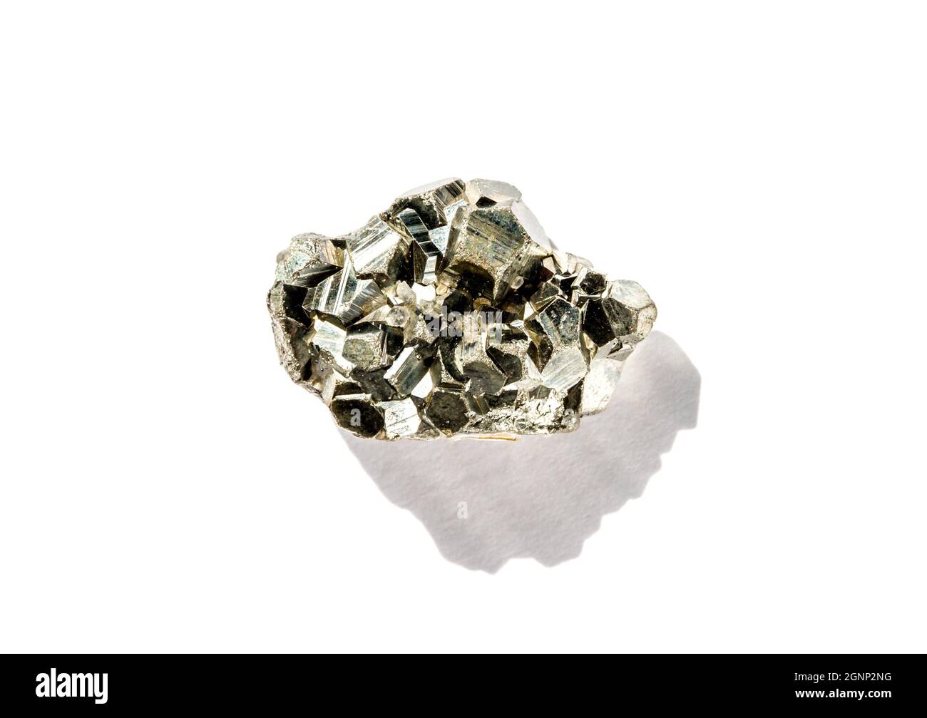 Pyrite gemstone isolated on a white background Stock Photo - Alamy