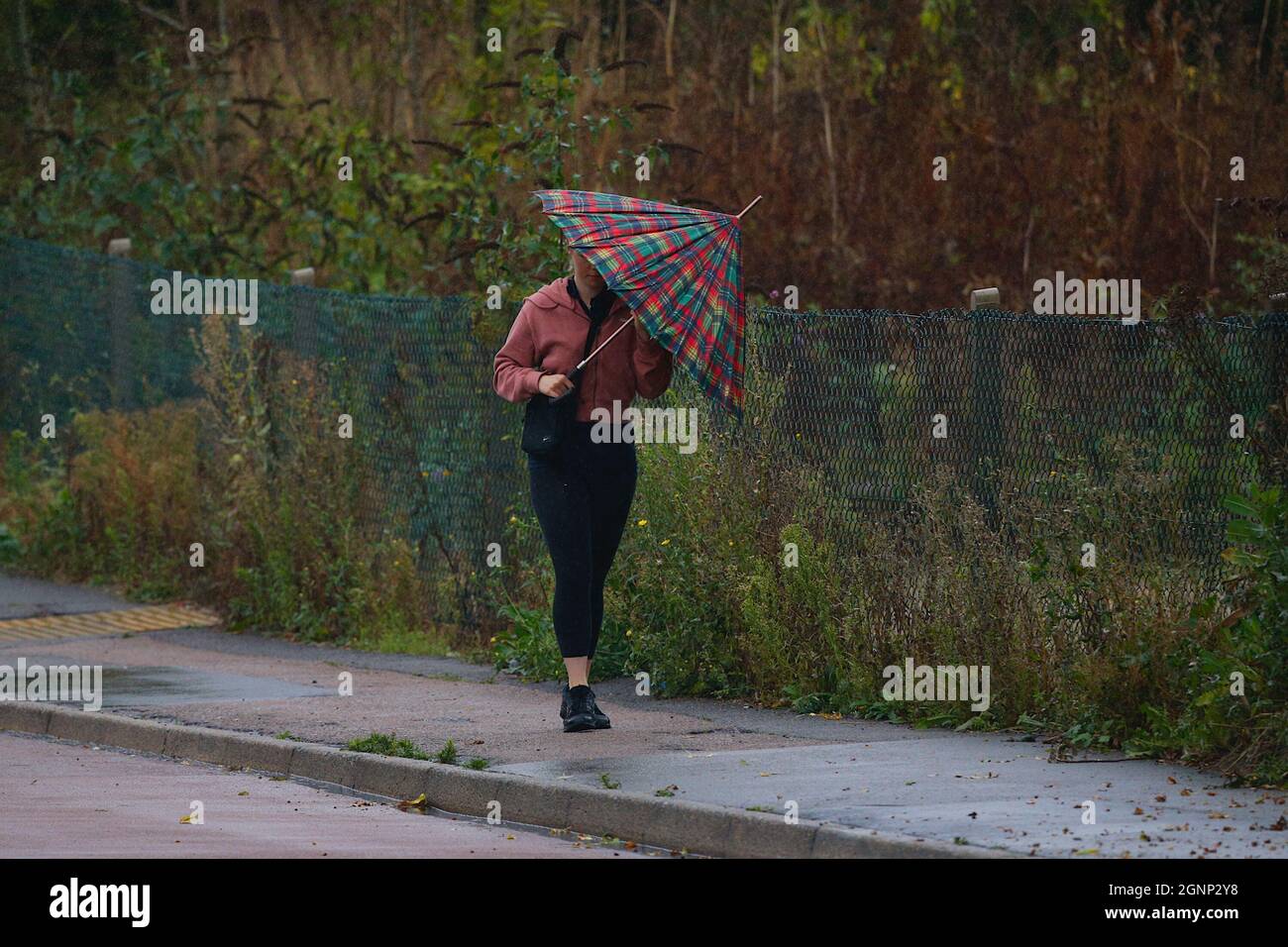 Windy day umbrella hi-res stock photography and images - Alamy