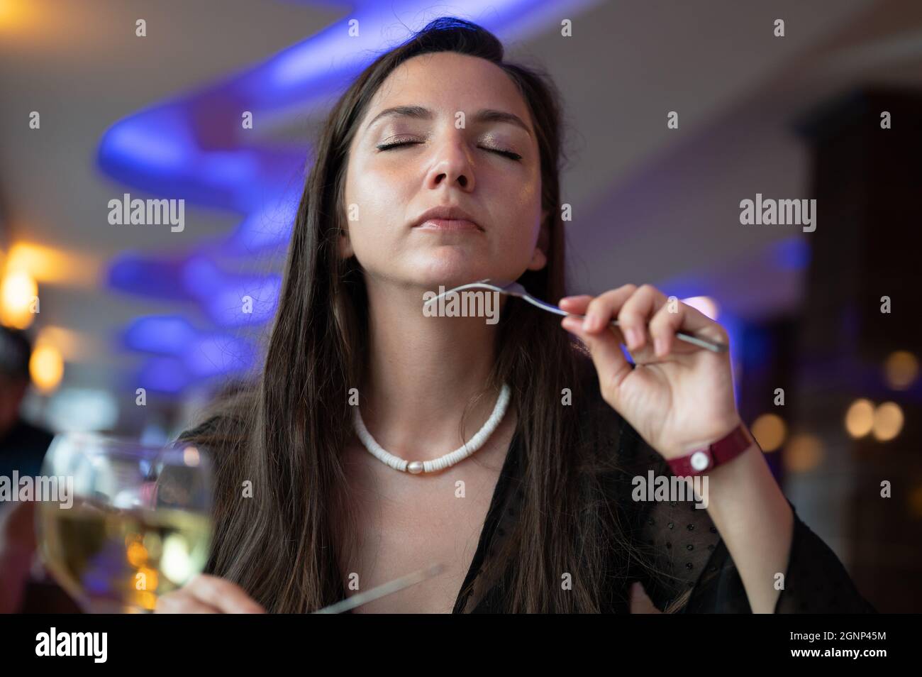 Young man eating in fancy restaurant hi-res stock photography and ...