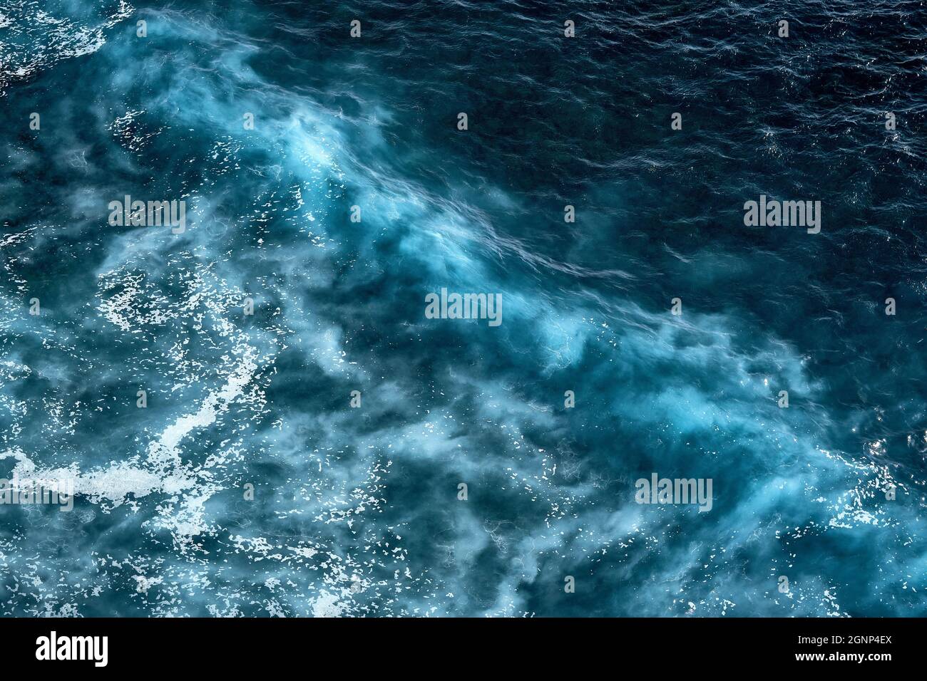 Aerial view to seething waves with foam. Waves of the sea meet each ...