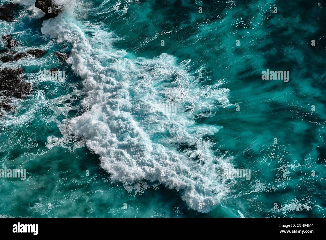 Aerial view to seething waves with foam. Waves of the sea meet each ...