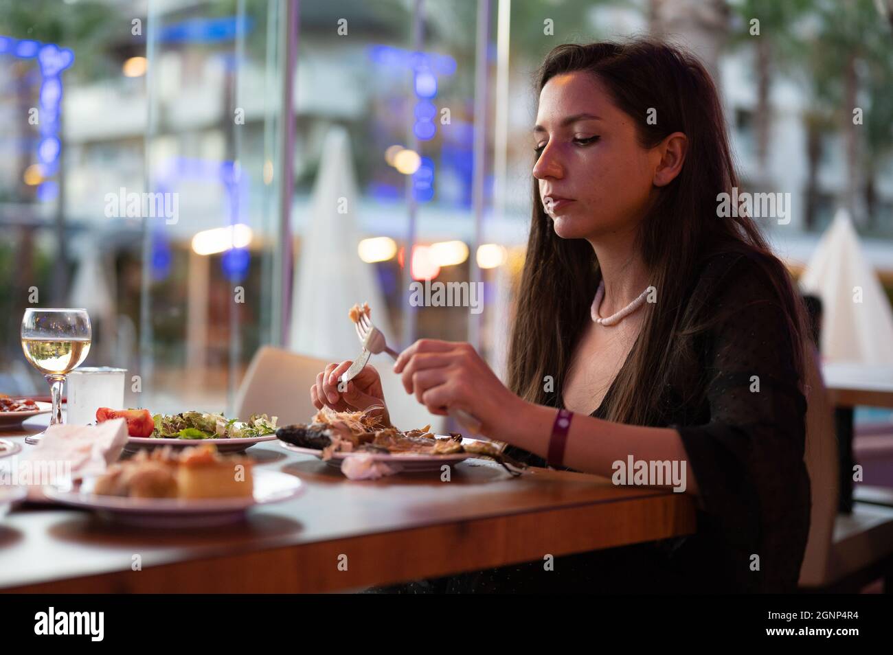 Young man eating in fancy restaurant hi-res stock photography and ...