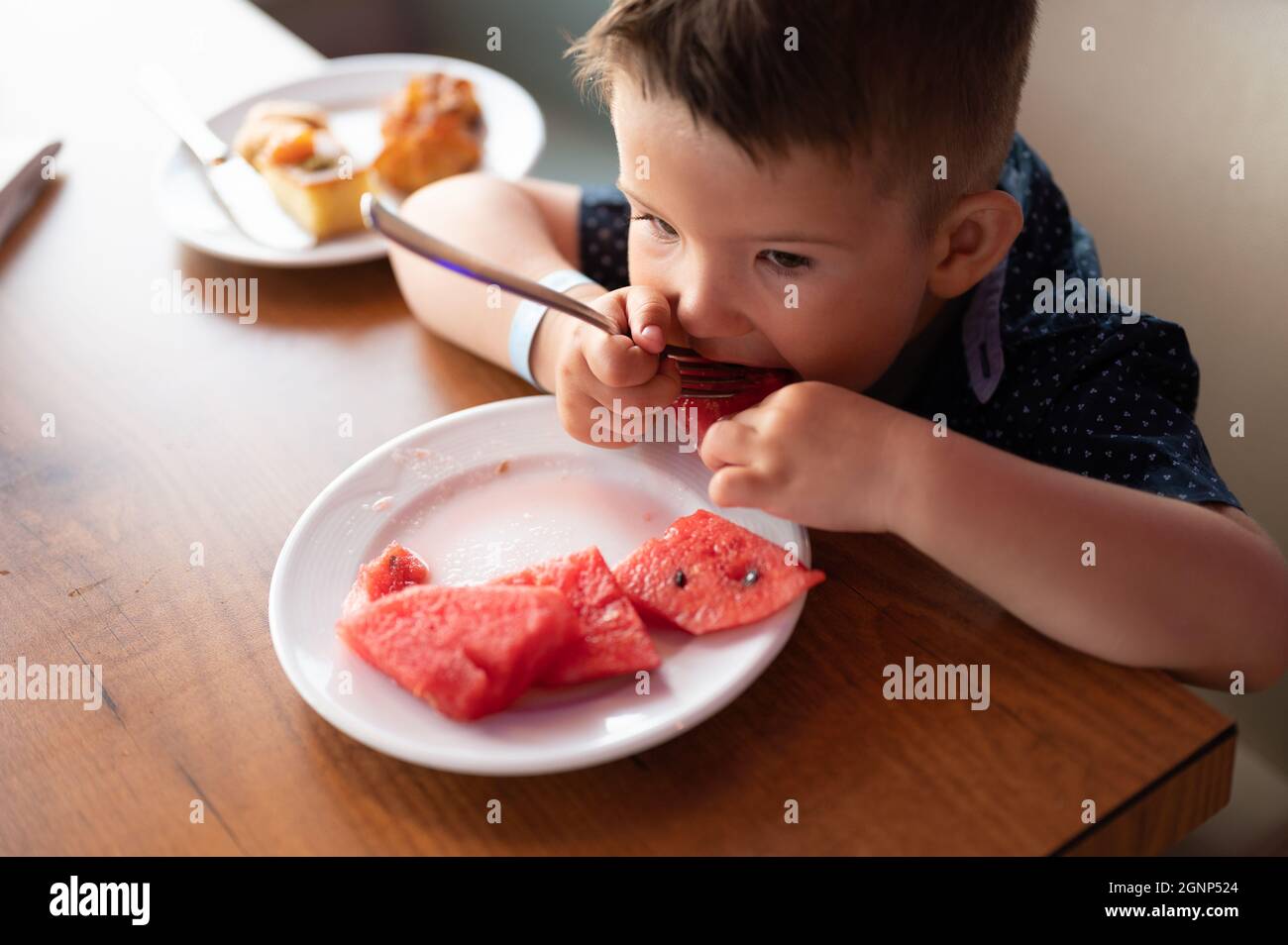 Cute baby eating watermelon hi-res stock photography and images - Alamy