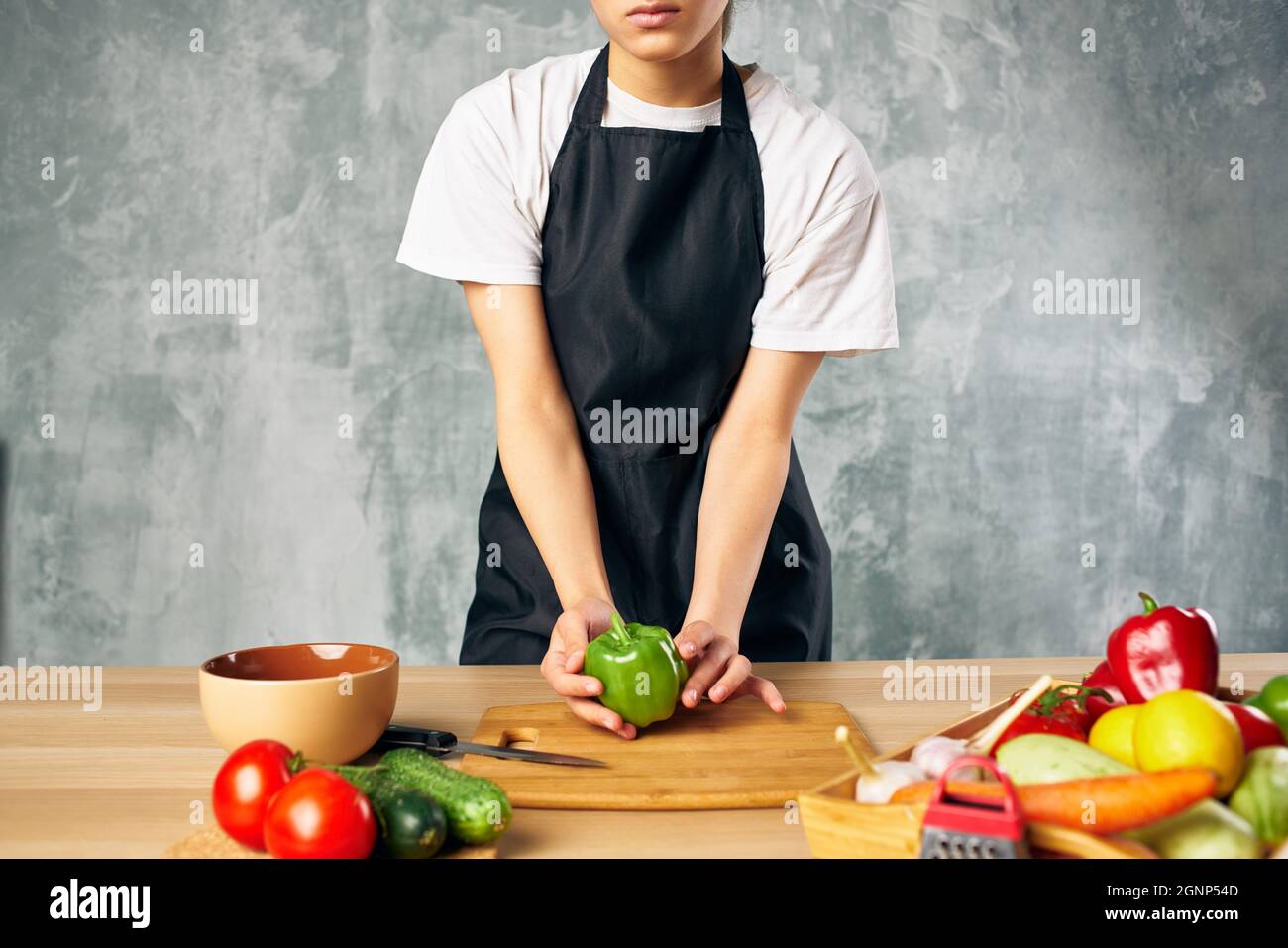 Cook woman Cooking healthy eating cutting board Stock Photo - Alamy